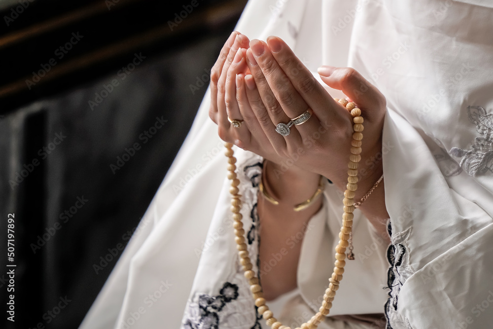 Muslim woman's hand Praying for the blessings of Allah At the mosque in ...