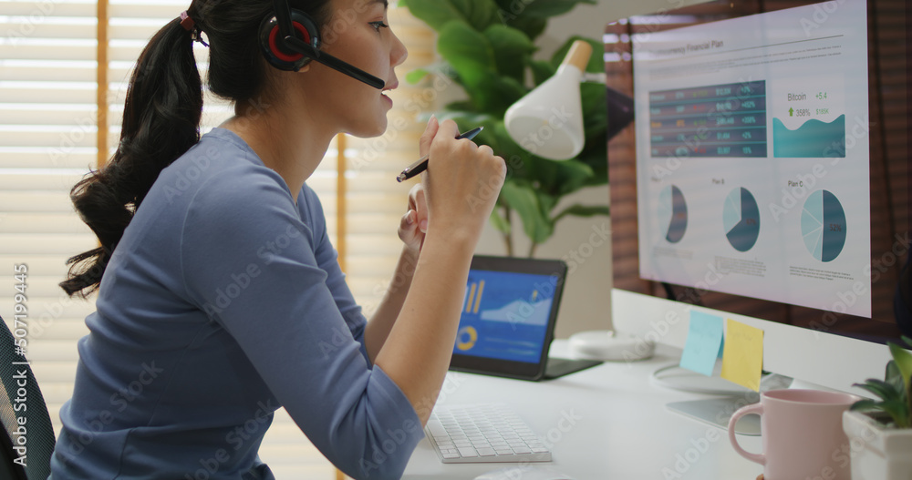 Asia people young casual woman remote work at desk home phone call talk ...