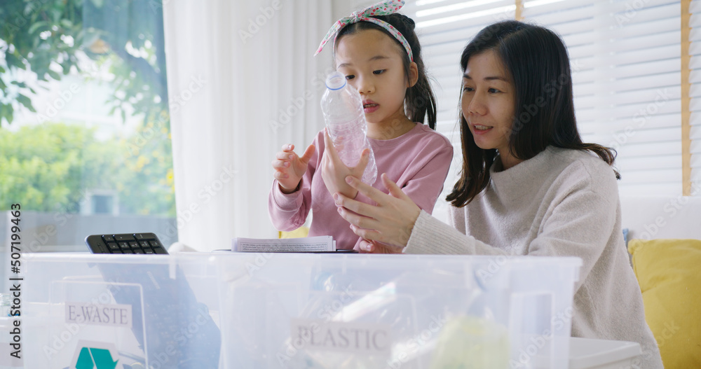 Mom teach Gen Z preteen girl kid dump paper glass can e-waste bag in ...