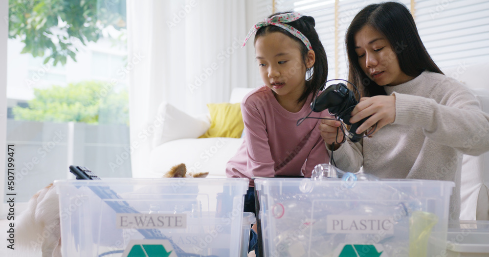 Mom teach Gen Z preteen girl kid dump paper glass can e-waste bag in ...