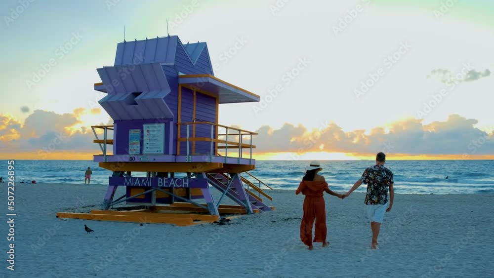 MiaMiami South Beach sunrise with lifeguard tower and coastline with ...