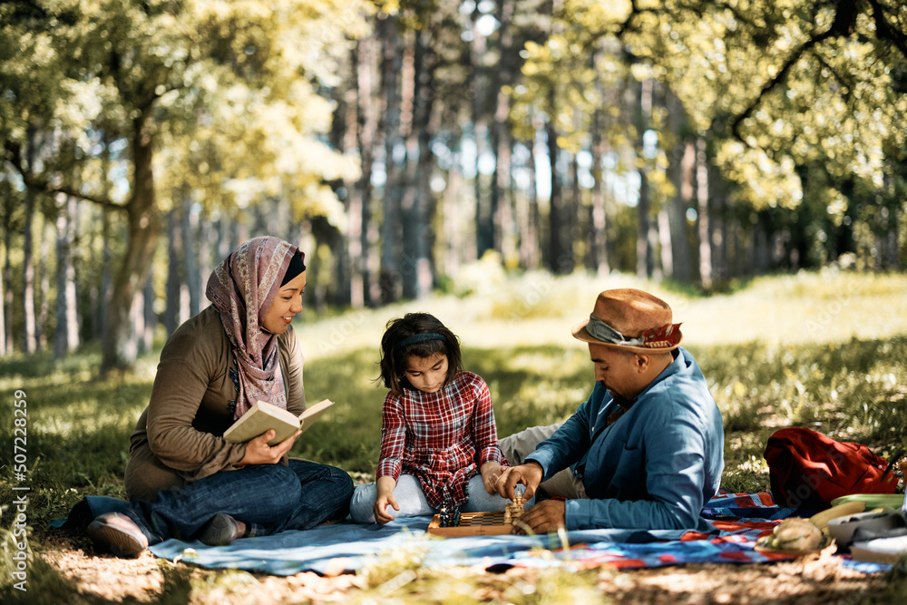 Middle Eastern family spending spring day on picnic in nature. Stock ...