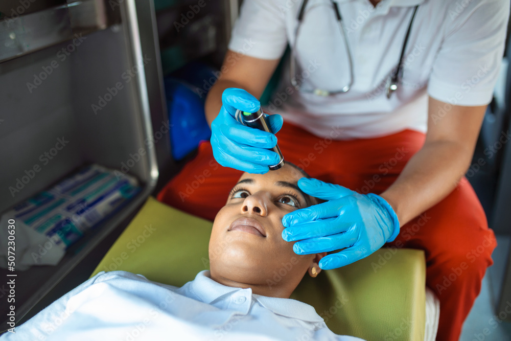 Close-up Portrait Shot of a Serious and Focused Paramedic in an ...