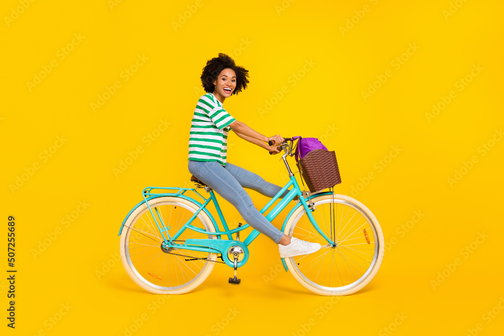 Full body profile photo of sweet millennial lady ride bicycle wear t ...