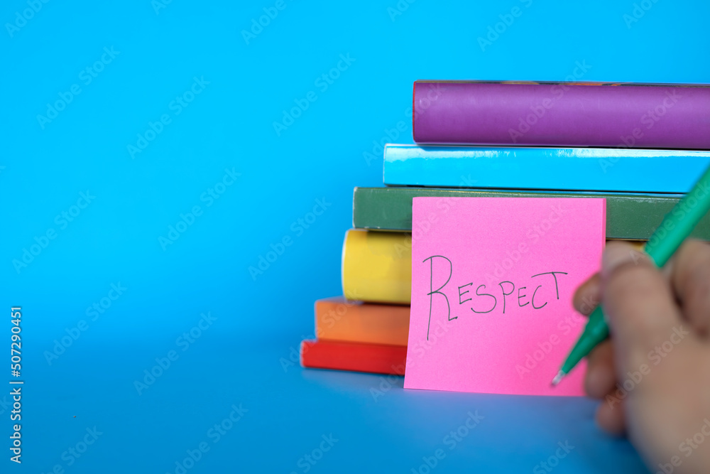 word respect written on the spines of books stacked in the colors of ...