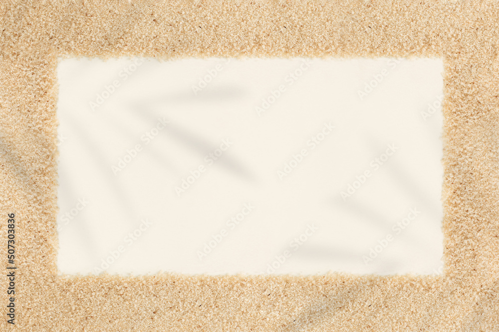 A square-shaped frame made of sand of fonio millet grain on a pastel ...