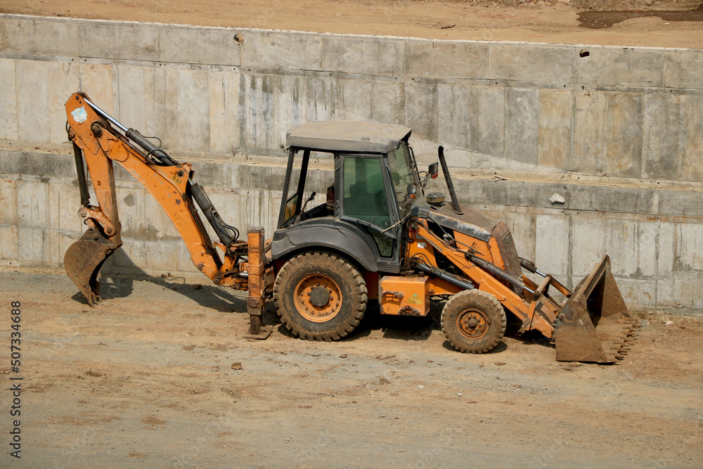 JCB parked at construction site in India Stock Photo | Adobe Stock