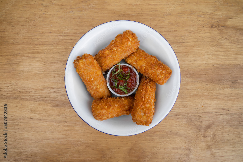 Gastronomy. Rustic presentation. Top view of fried mozzarella cheese ...