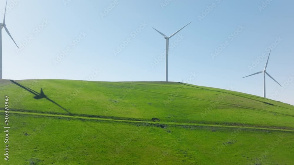 4k cinematic aerial California countryside. Windmill park green energy ...