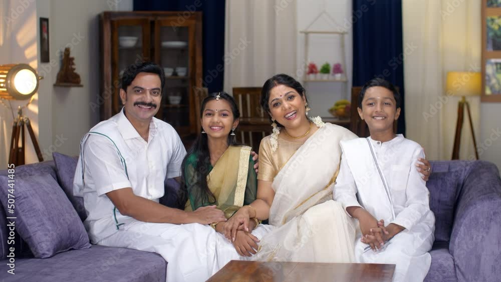Vídeo do Stock: A happy South Indian couple with their two young kids ...