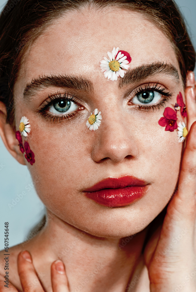 Beautiful fashion model portrait, spring make up style with flowers ...