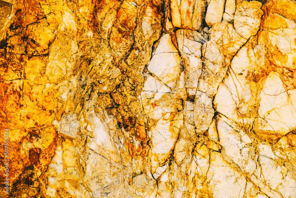 Shimmering surface. Gold texture. Golden Ore rocks. Stone background ...