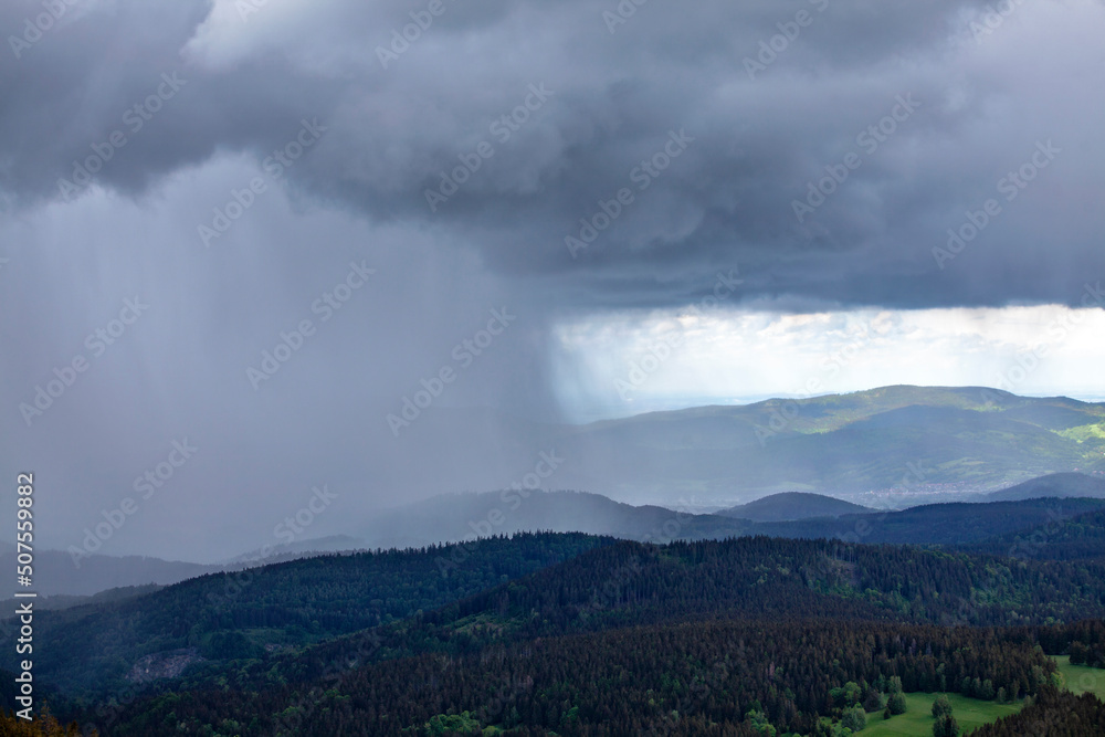 Rain cloud fall over mountain forest. Storm rainy weather cloudy sky ...