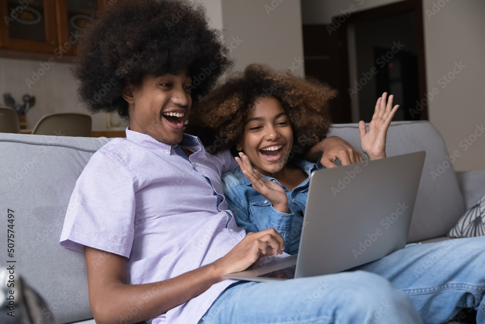 Staring At A Computer Laughing