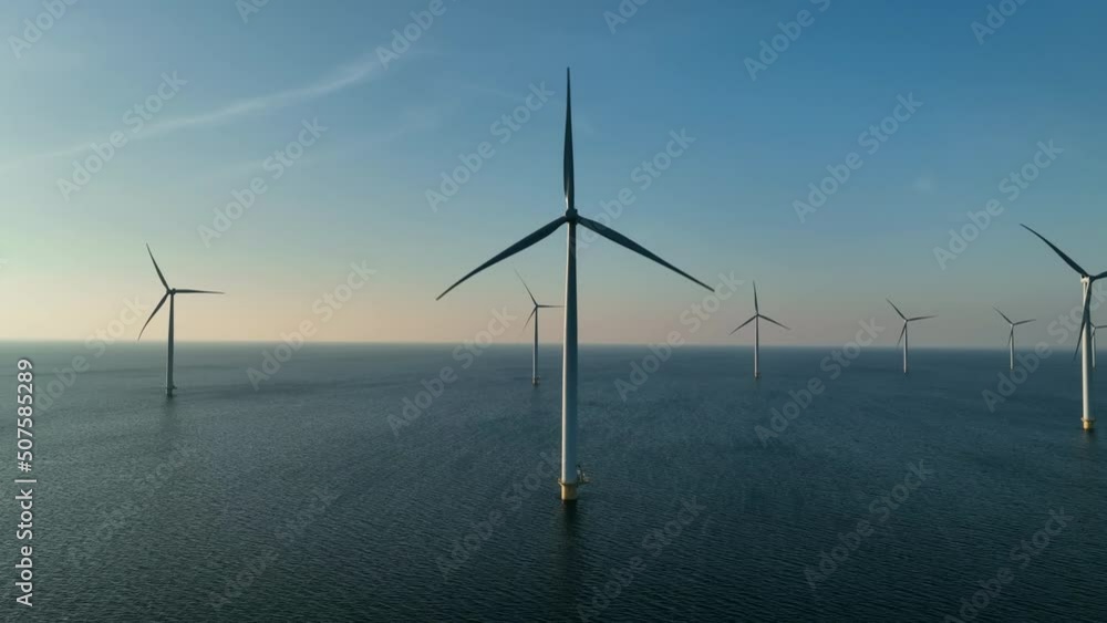 Wind turbines producing sustainable renewable energy in an offshore ...