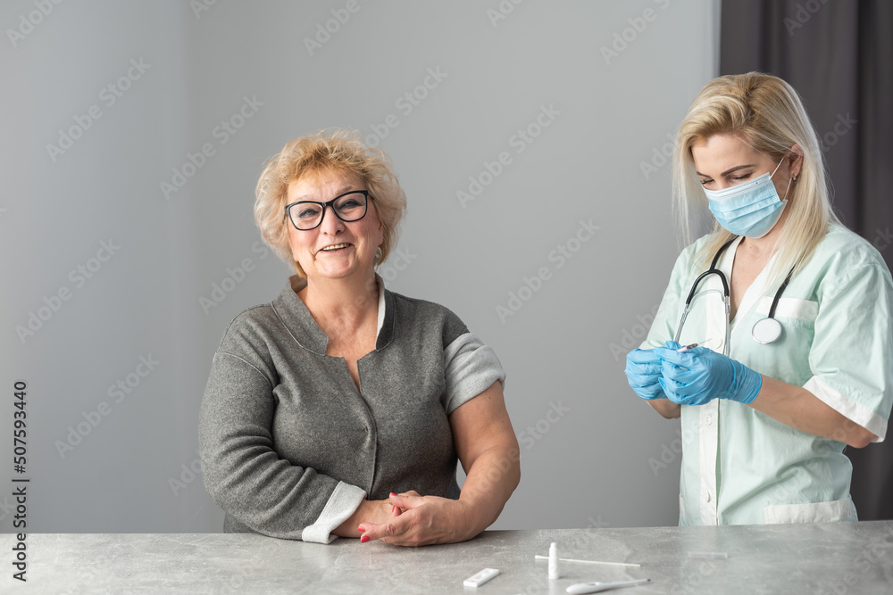 Senior vaccination concept. Elderly getting immune vaccine at arm for ...