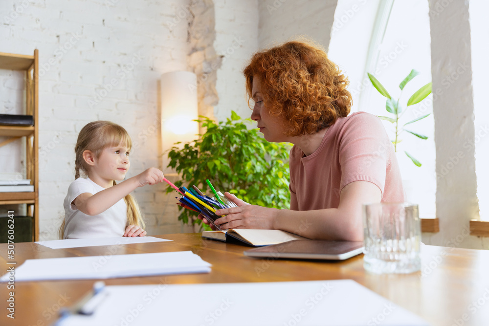 Young therapist woman speaking with child, counselor and behaviour ...