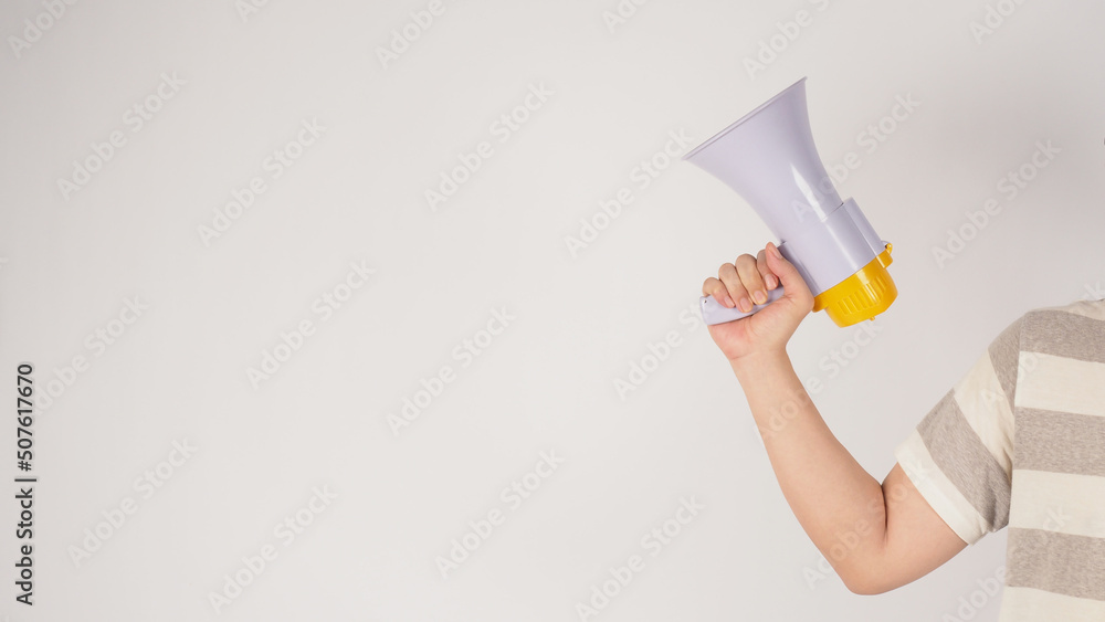Asian male's hand is hold megaphone on white background. Stock Photo ...
