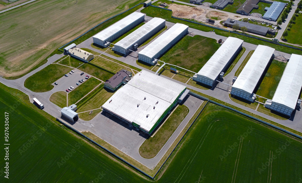 Aerial view of the rural landscape with agro farms barns and stables ...