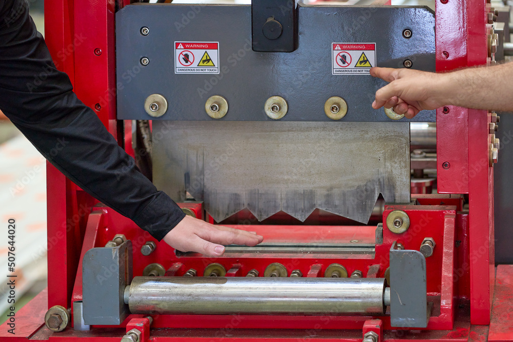 Prohibition sign for machine of metal sheet factory to protect and ...