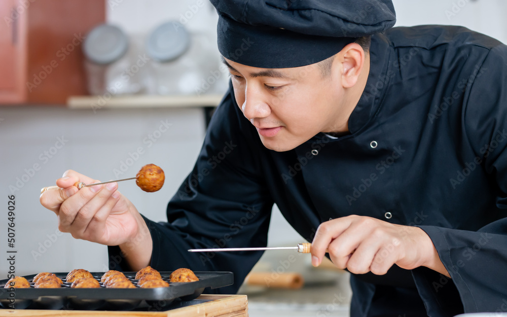 Portrait close up handsome professional Japanese male chef wearing ...
