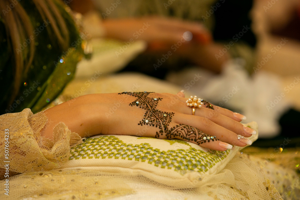 Henna Tattoo on Bride's Hand.Moroccan wedding preparation henna party ...