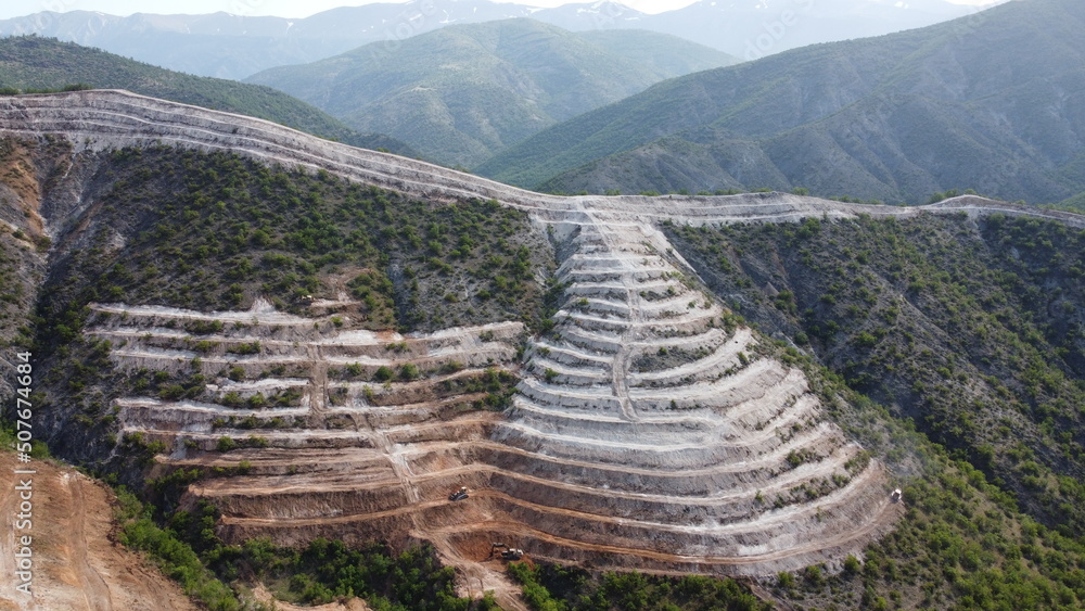 Civil works and terrain preparation on a mountain for construction of ...