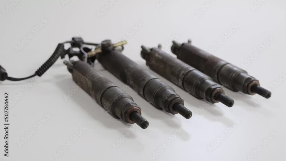 Needles and nozzles on nozzles from a diesel engine. Deterioration of ...