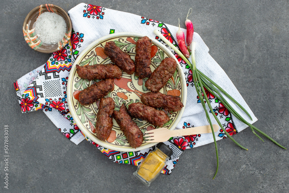 Romanian , traditional meat rolls, called ”mici” or ”mititei” on a ...