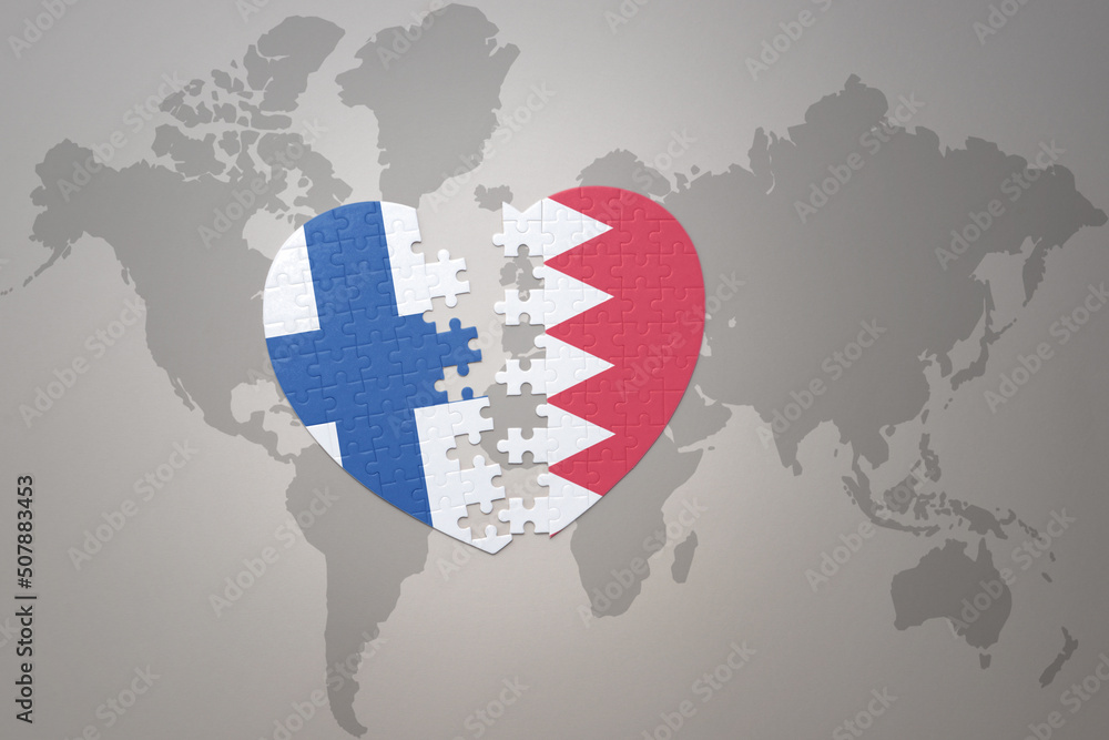 puzzle heart with the national flag of bahrain and finland on a world ...