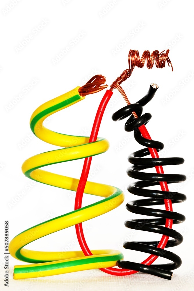 Different coloured wires used for electrical wiring. The colour ...