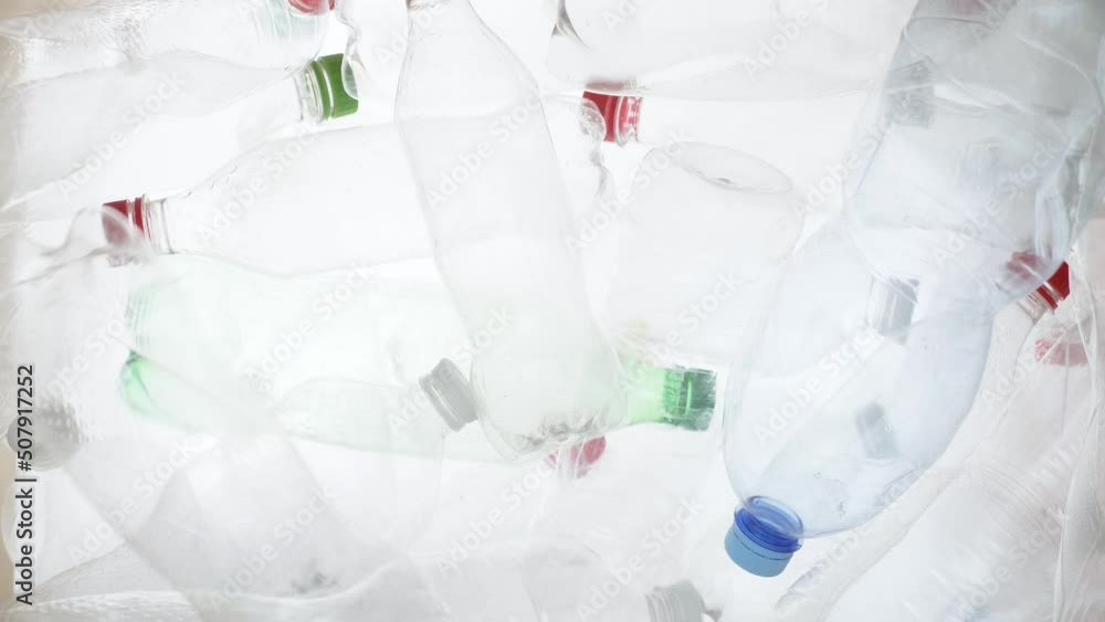 Empty plastic bottles falling down. Water PET bottle recycling plastic ...