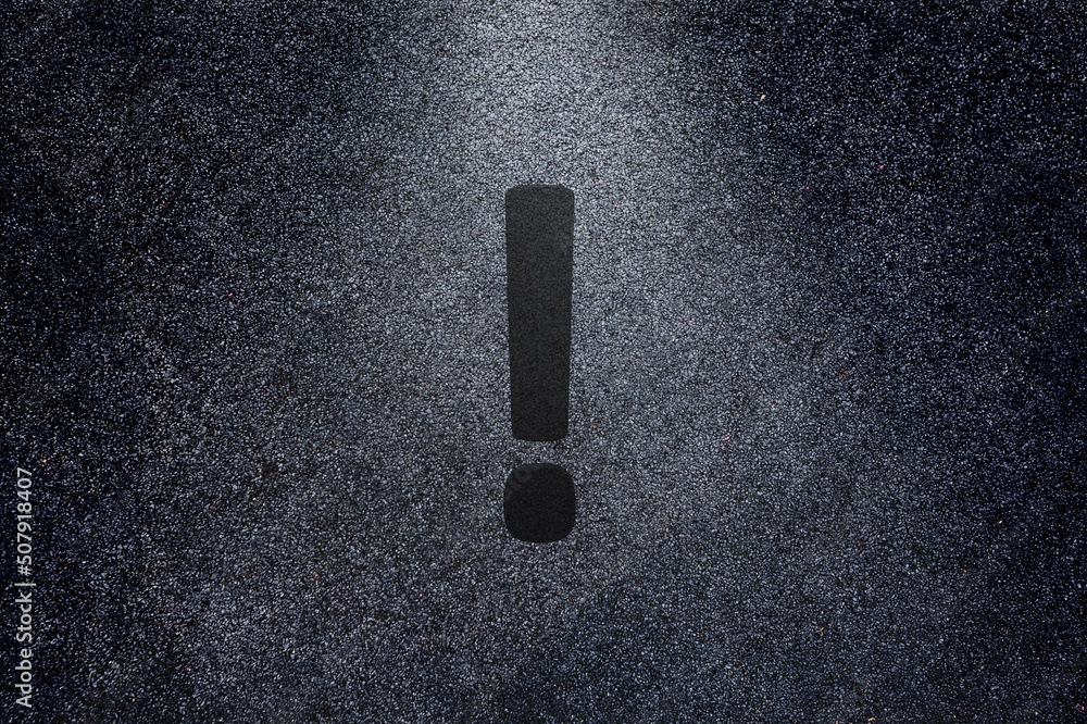 Exclamation mark design with spotlight on textured wall background ...