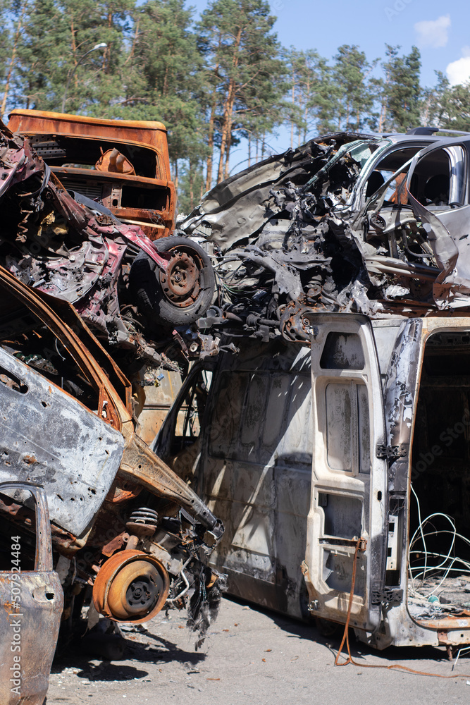 war in ukraine. Car graveyard. Shot cars of civilians. russia's war ...