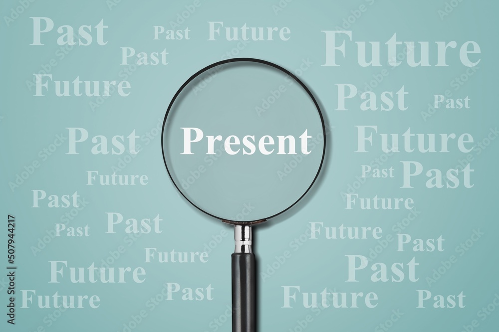 Present wording inside of Magnifier glass on background for focus ...