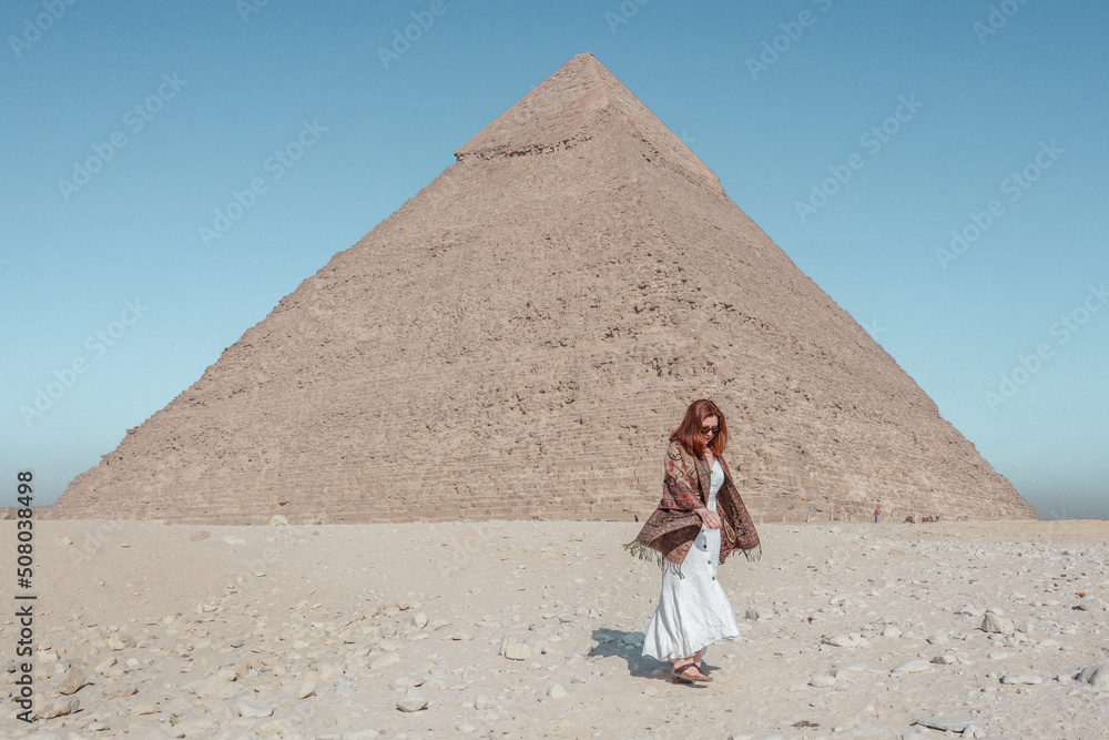 Woman wandering around the Pyramids of Giza in Caïro. Stock Photo ...
