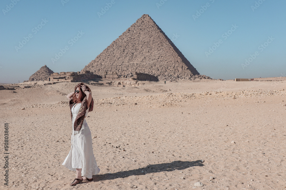 Woman wandering around the Pyramids of Giza in Caïro. Stock Photo ...