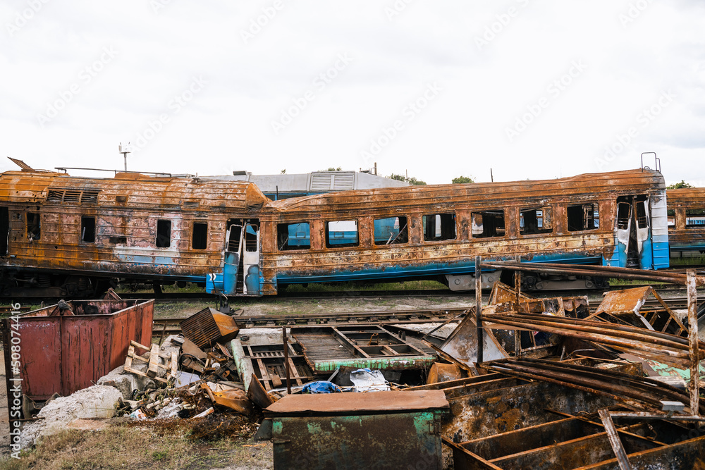 Exploded trains and wagons at the railway station in the city of ...