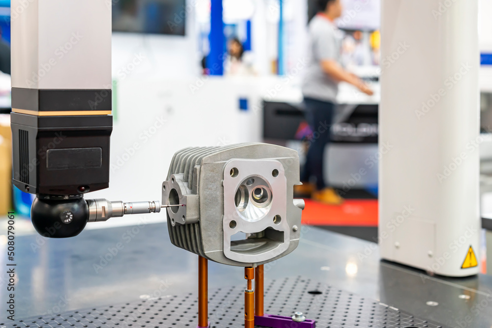 automatic coordinate measurement machine (CMM) during inspection ...