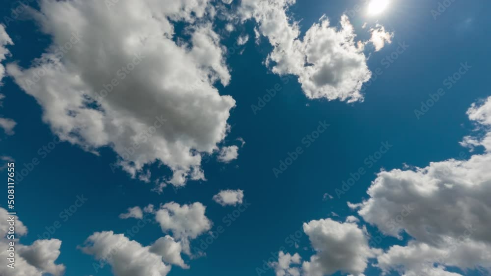 Time lapse fast moving white clouds and blue sky. Open sky cloud mass ...