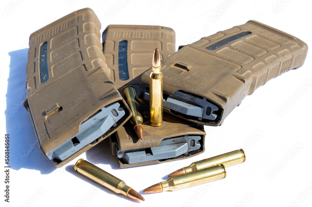Three AR 15 magazines with bullets for them on a white background Stock ...