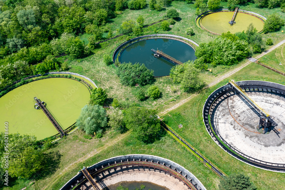 Sewage farm. Aerial photo looking down onto the clarifying tanks and ...