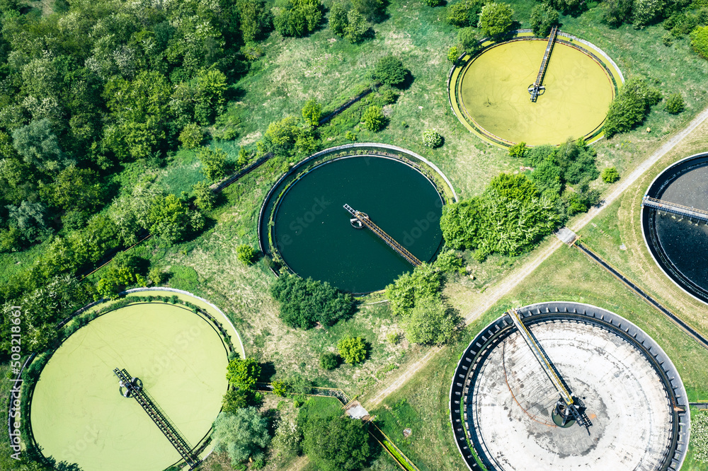 Sewage farm. Aerial photo looking down onto the clarifying tanks and ...