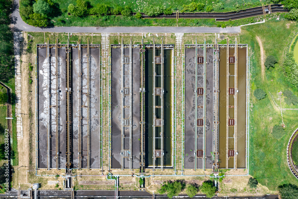 Sewage farm. Aerial photo looking down onto the clarifying tanks and ...