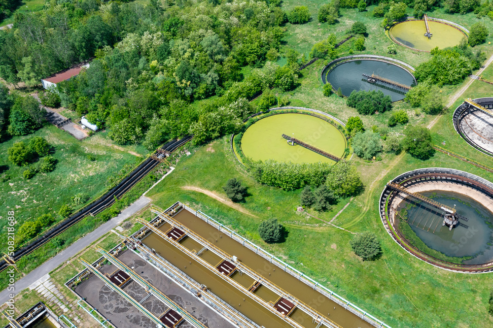 Sewage farm. Aerial photo looking down onto the clarifying tanks and ...