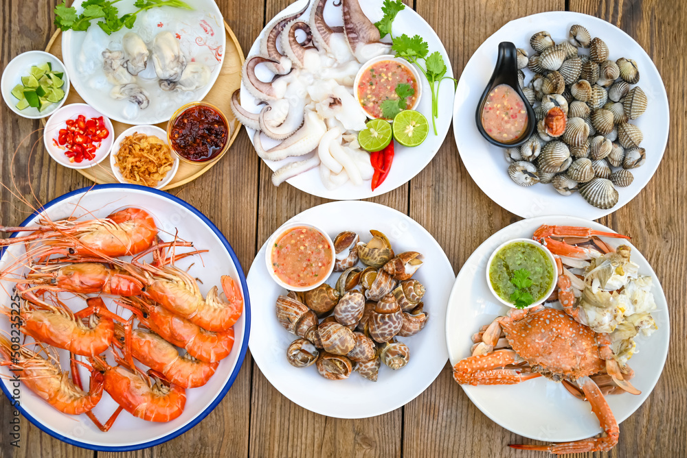 seafood plate with shrimp shellfish crab squid cockle spotted babylon ...