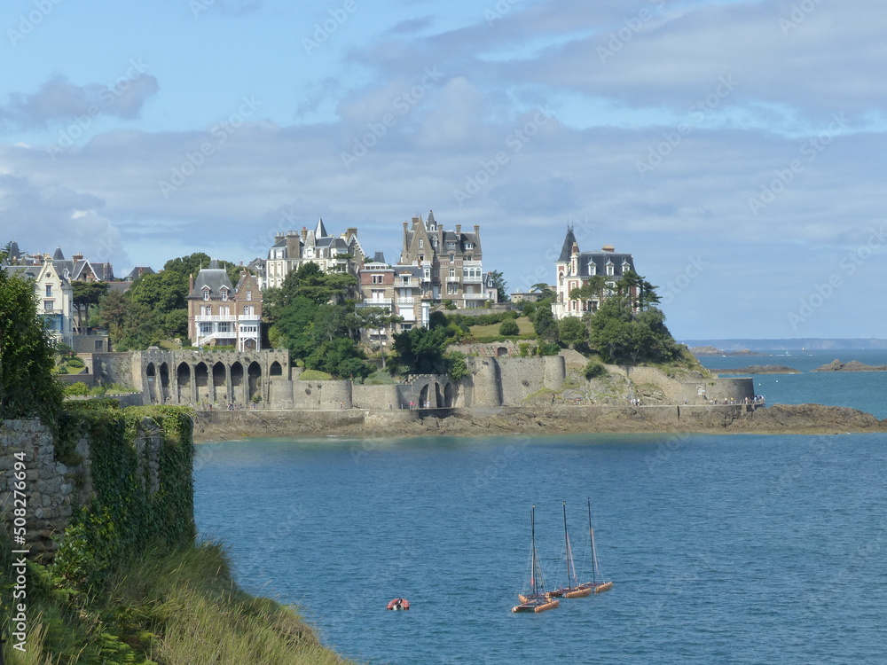 Dinard, France - August 2018 : Walking on the beach of Dinard on the ...