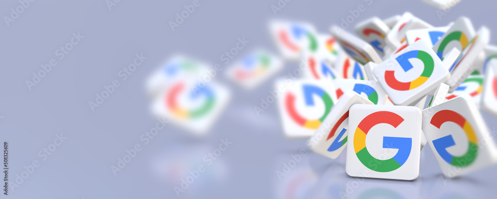 Google company logos fall on a table. Banner format with copy space and ...