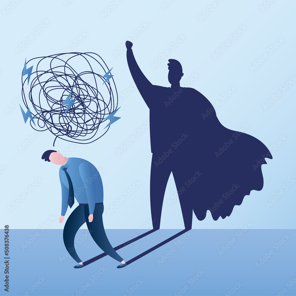 Self doubt entrepreneur standing with his super hero shadow on wall ...