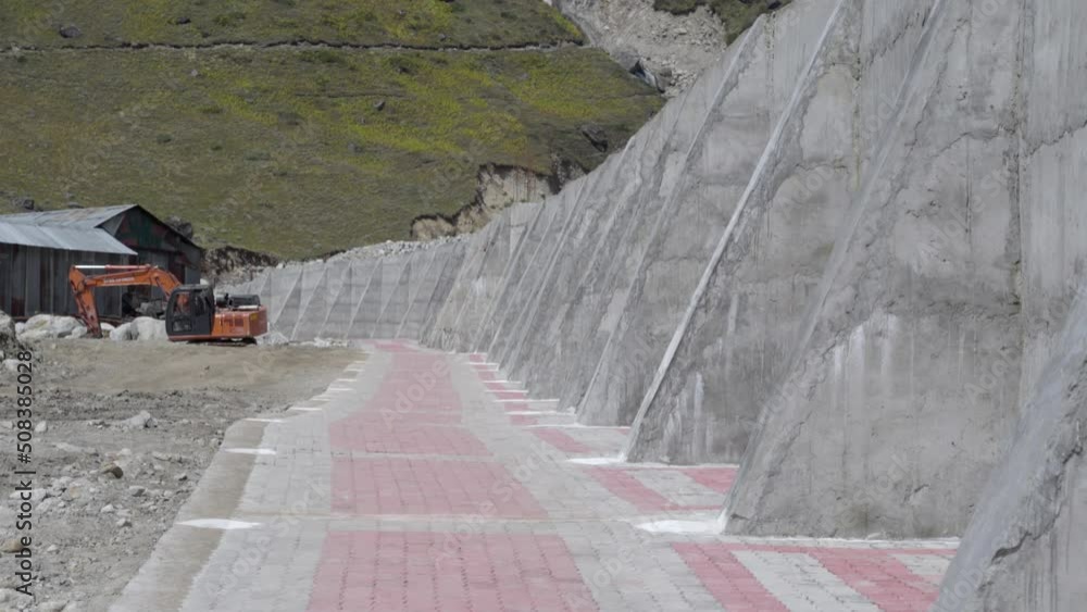 Wall construction process around the Himalayan Valley of Kedarnath ...